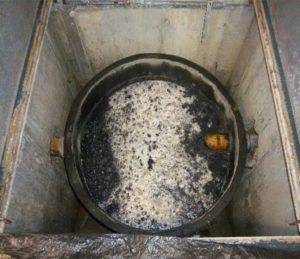 Acid Waste Neutralization Tank Cleaning for School District